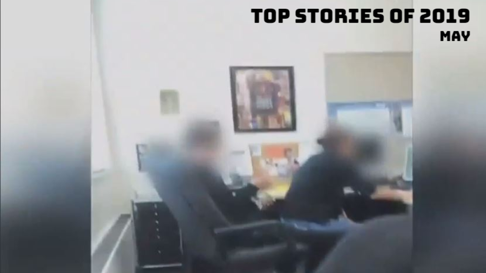 Video shows teacher aide sit on male high school student's lap in front ...
